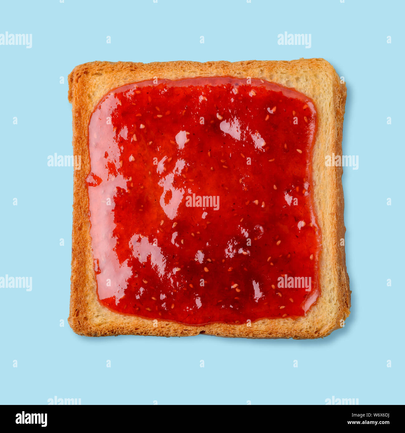 Toast with raspberry jam Stock Photo - Alamy