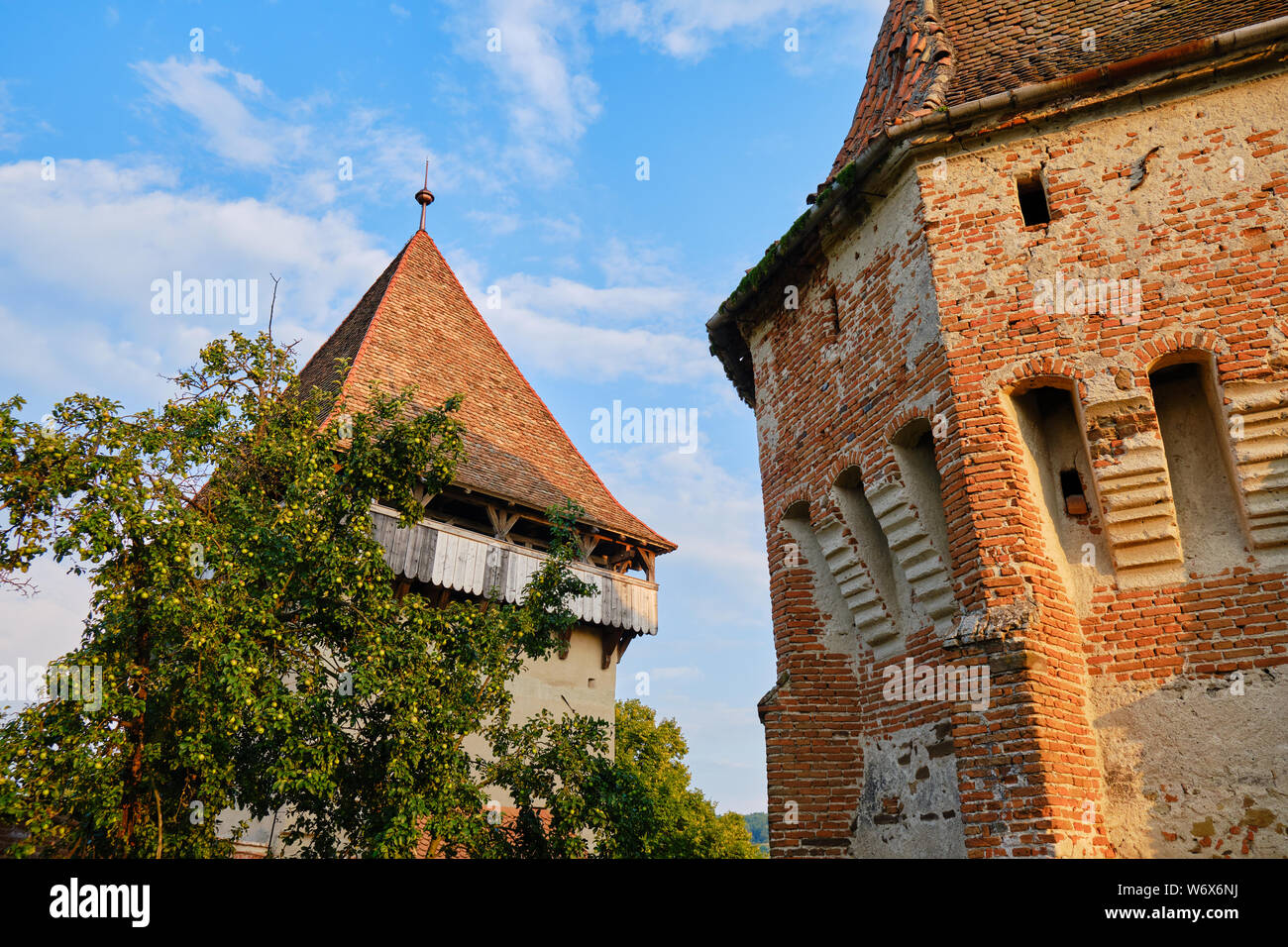 Alma Vii Fortified Church - renovated exterior walls in the warm sunset ...