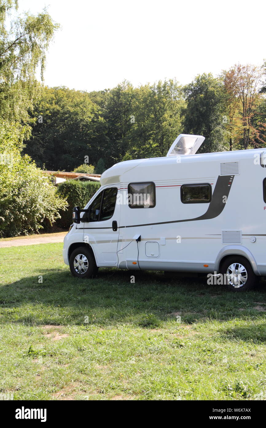 Caravan in the sunset Stock Photo - Alamy