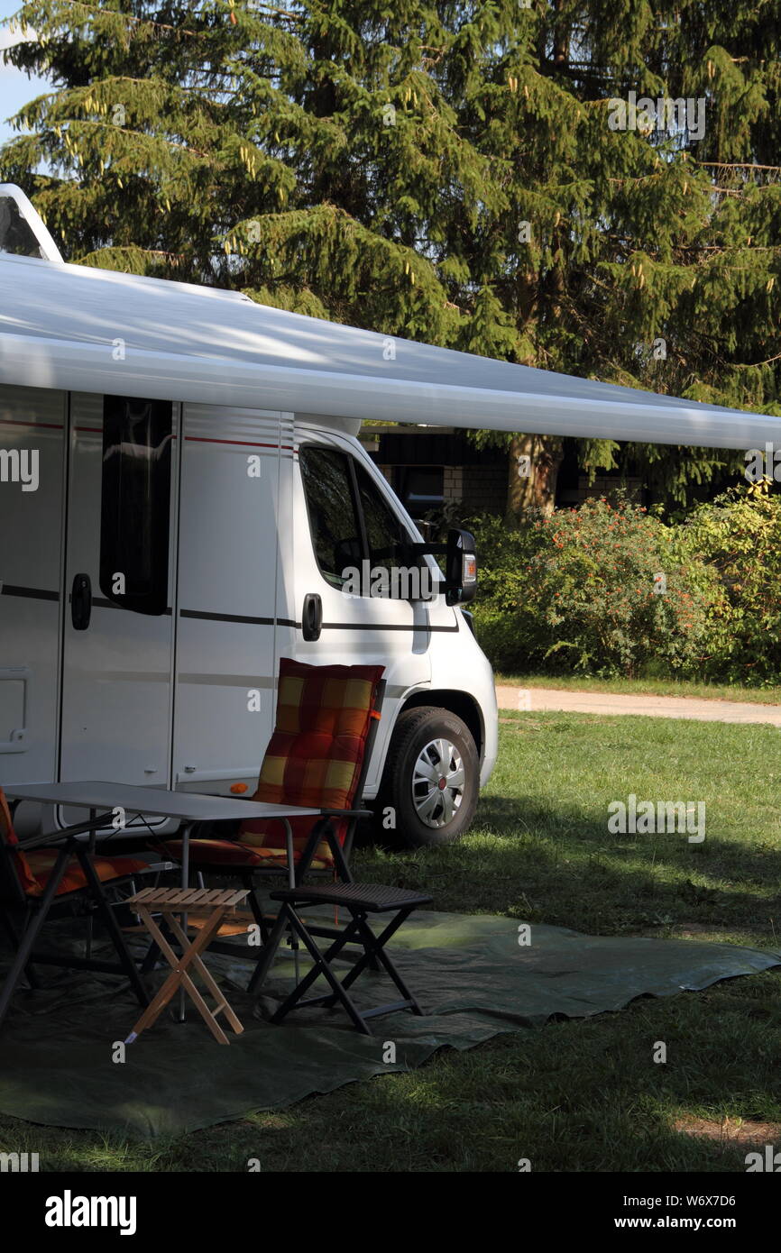 Caravan in the sunset Stock Photo - Alamy