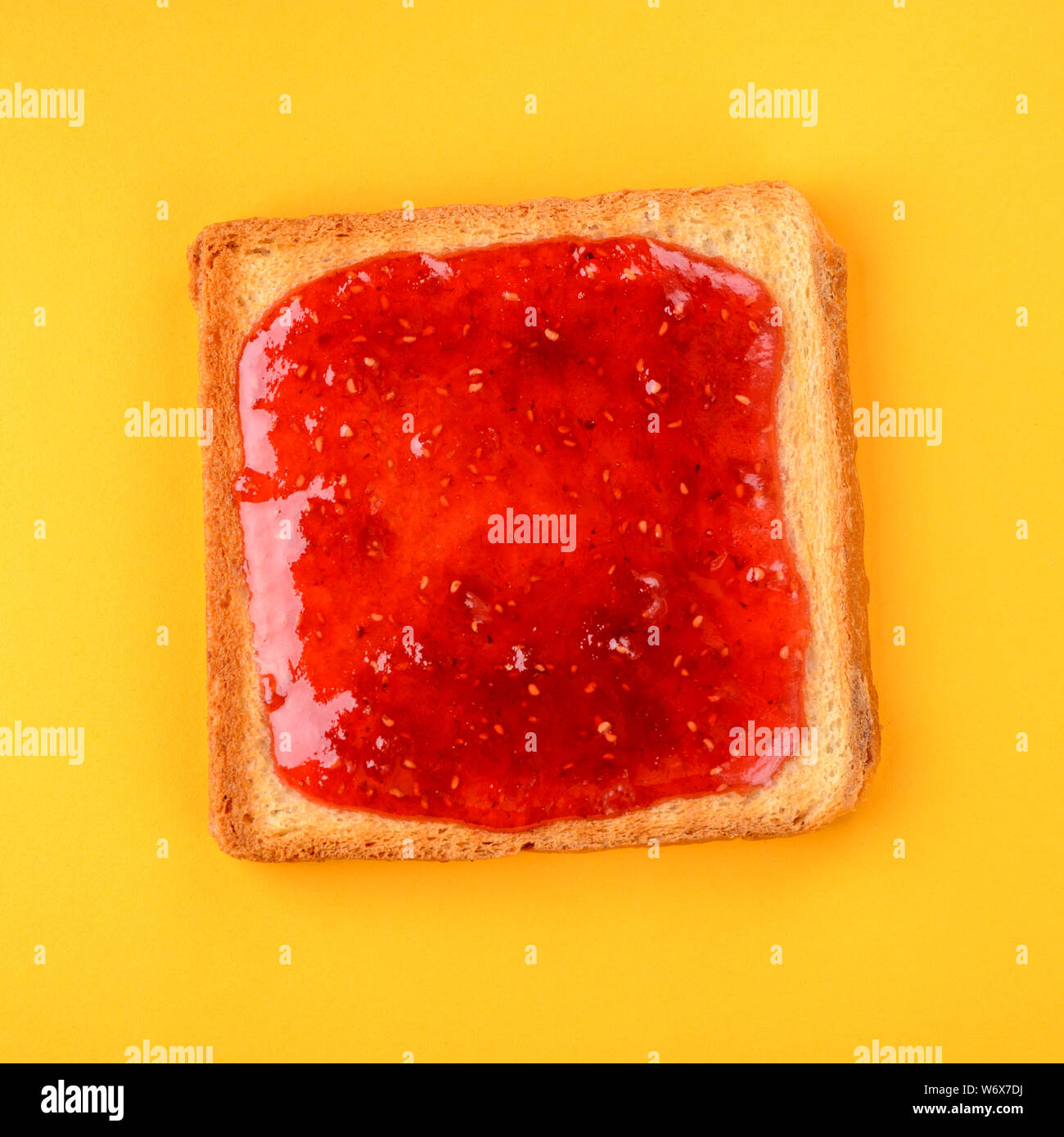 Toast with raspberry jam Stock Photo - Alamy