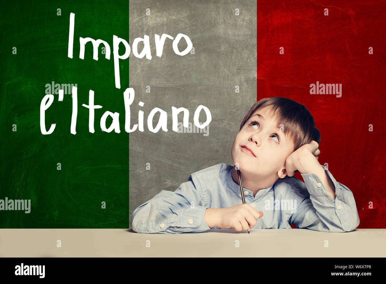 Thinking child boy student against the Italy flag background. Italian ...