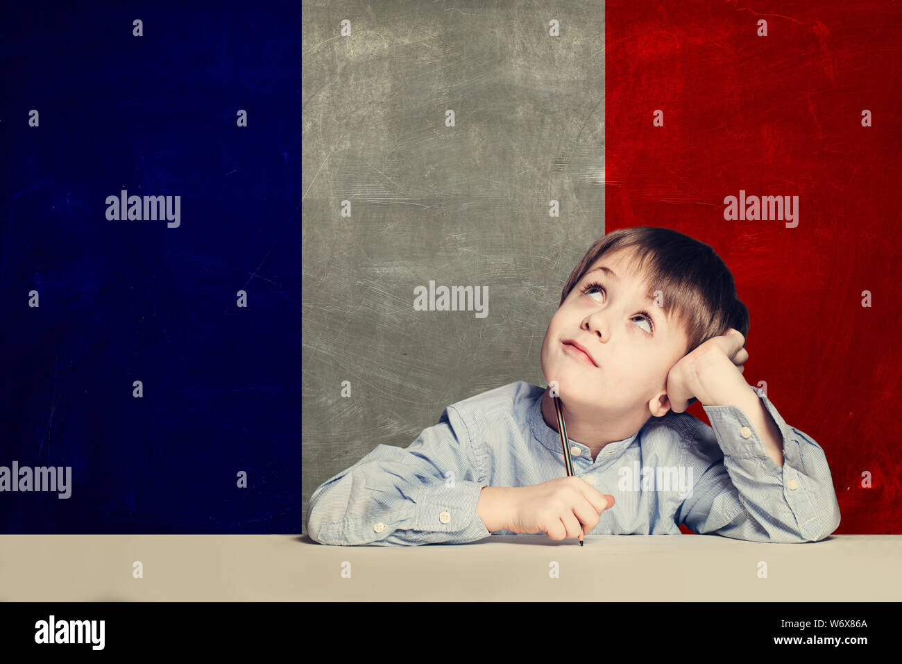 Learn french language concept. Happy child student with flag France ...