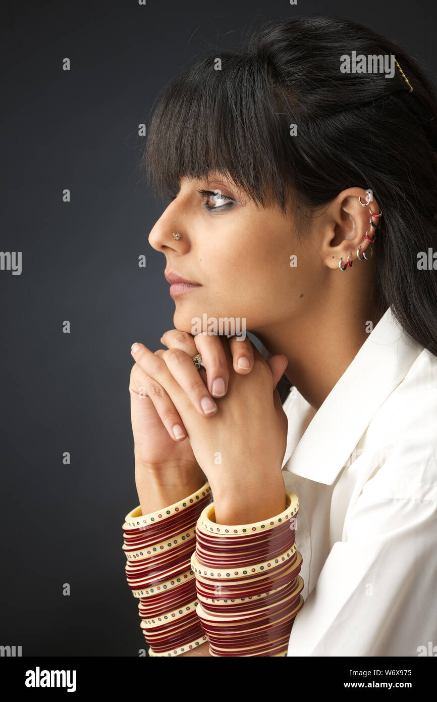 Side profile of a woman thinking Stock Photo - Alamy