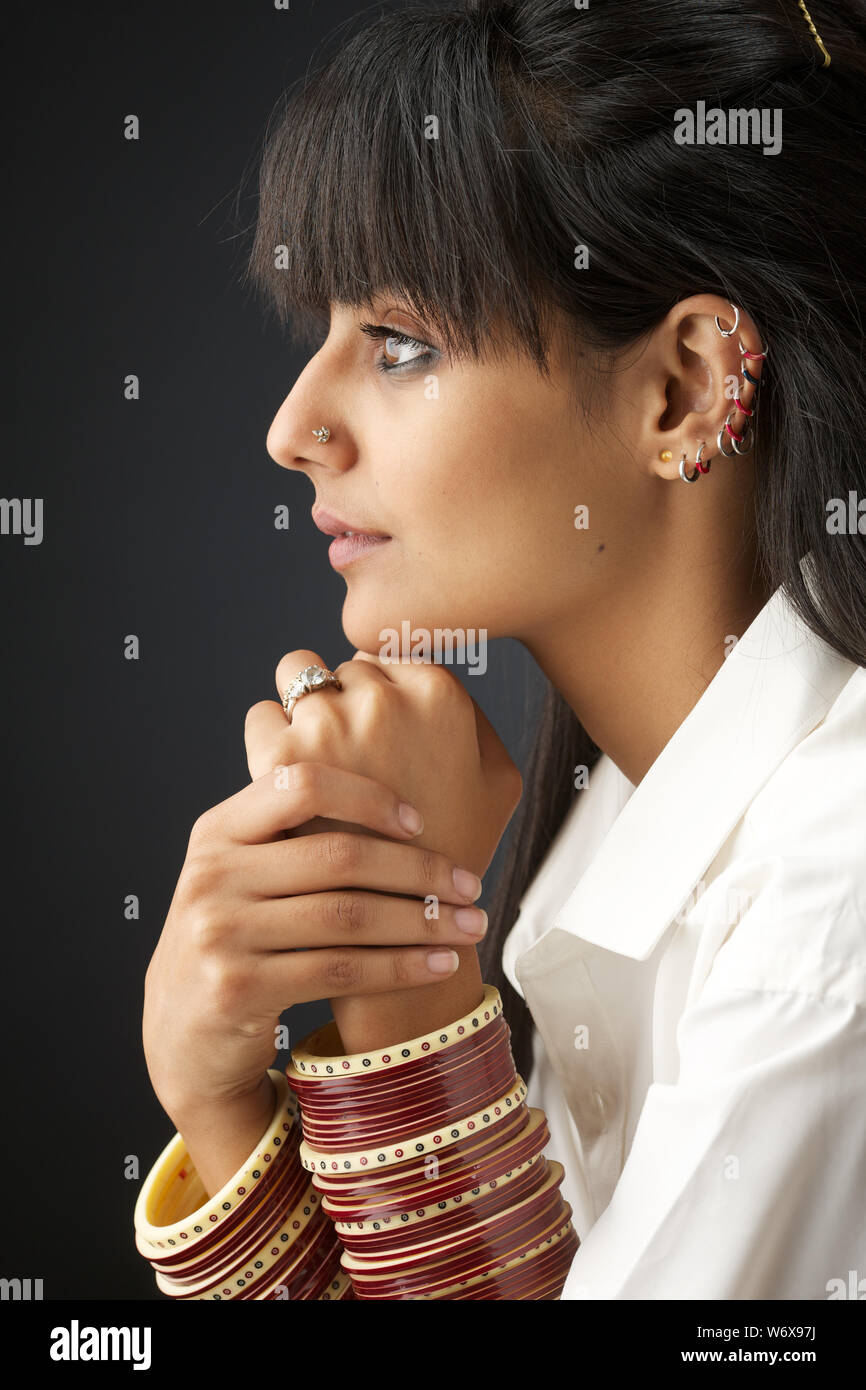 Side profile of a woman thinking Stock Photo - Alamy