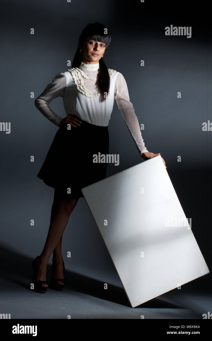 Business woman posing legs crossed hi-res stock photography and images ...