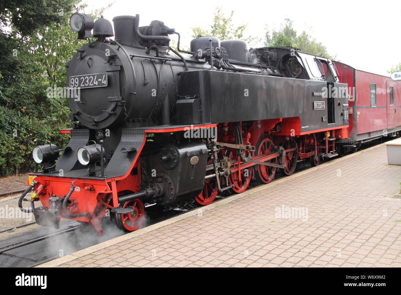 old steam locomotive at the train station Stock Photo - Alamy