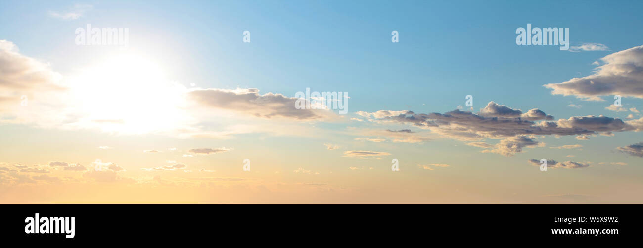 Blue sky clouds background. Beautiful landscape with sun Stock Photo ...