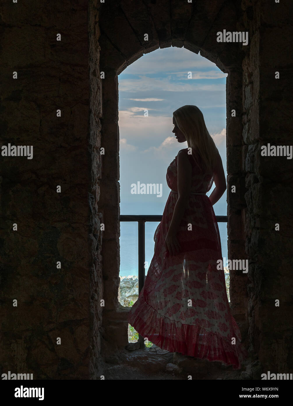 Woman looking out window snow hi-res stock photography and images - Alamy