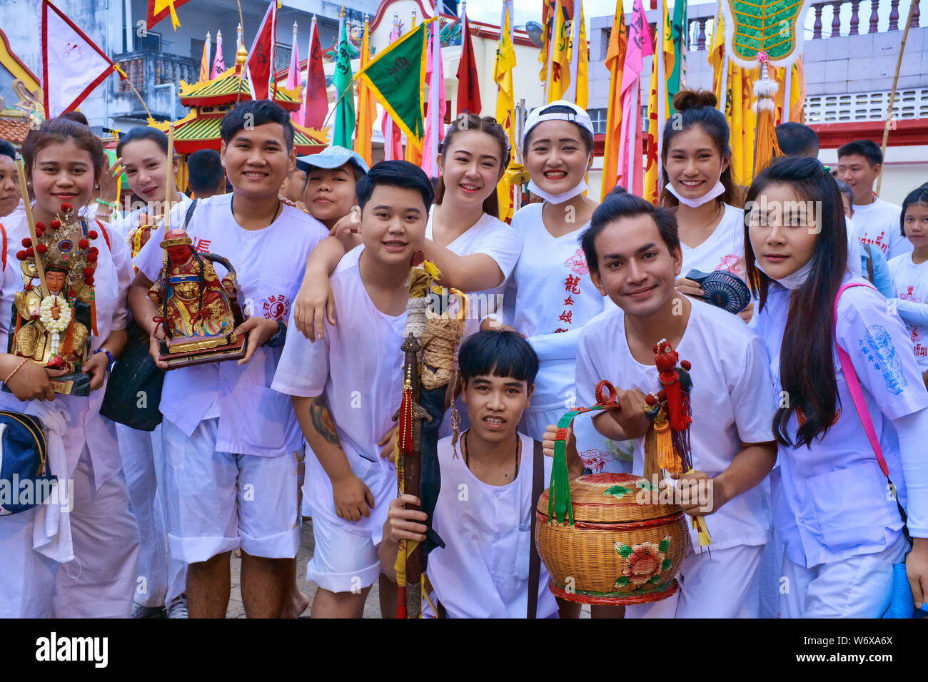 Young worshippers of Thai-Chinese descent at Jui Tui Temple in Phuket ...