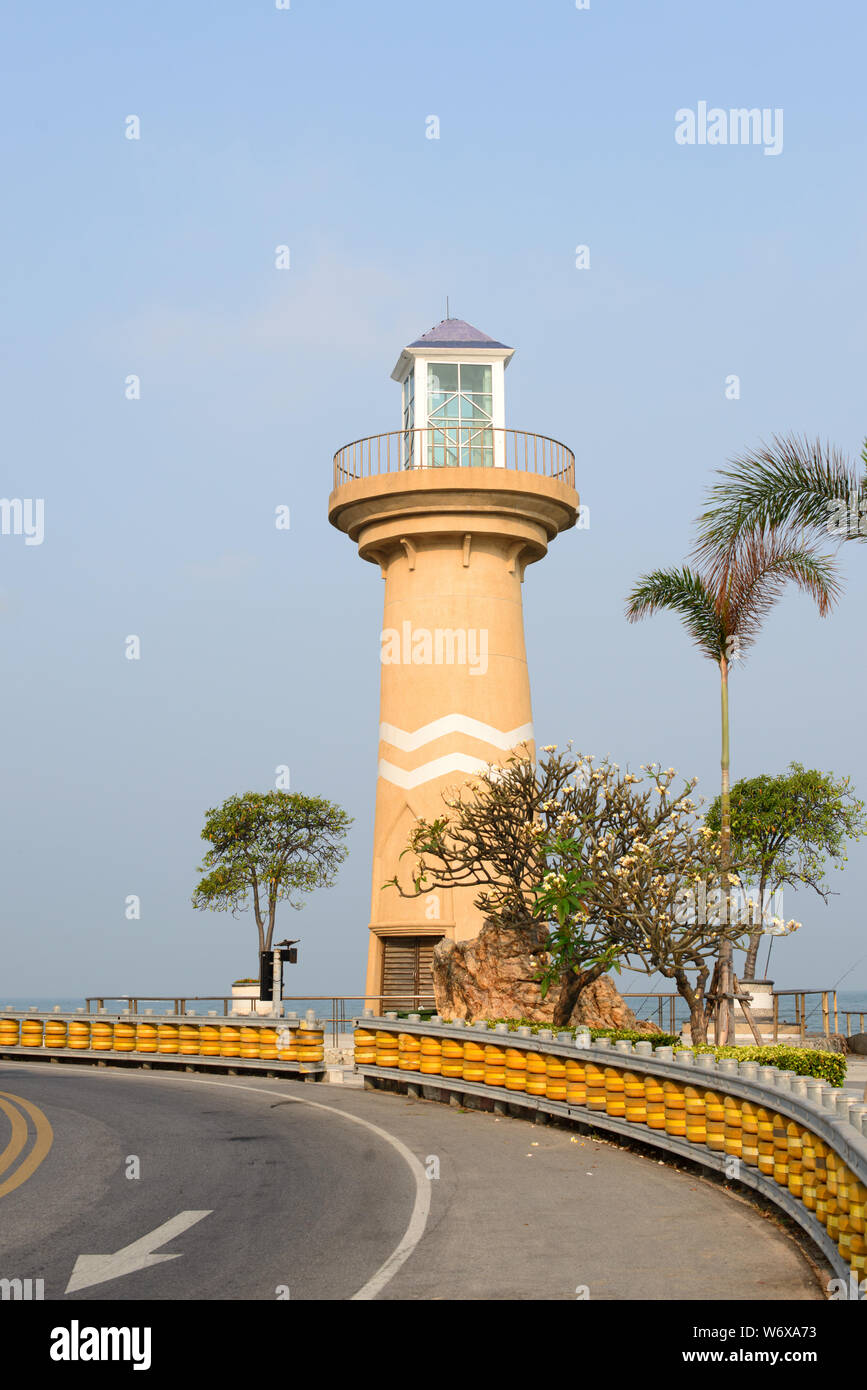 Beautiful lighthouse near the road in Pattaya city at sunny summer day ...