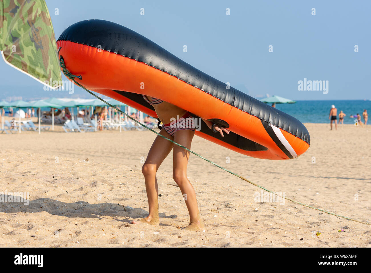 Girl on inflatable boat hi-res stock photography and images - Alamy
