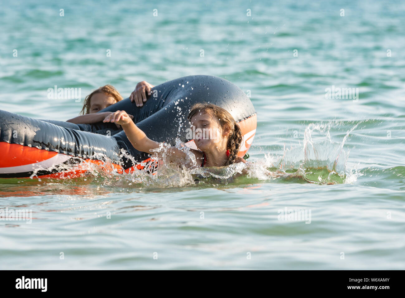 Children jump boat hi-res stock photography and images - Alamy