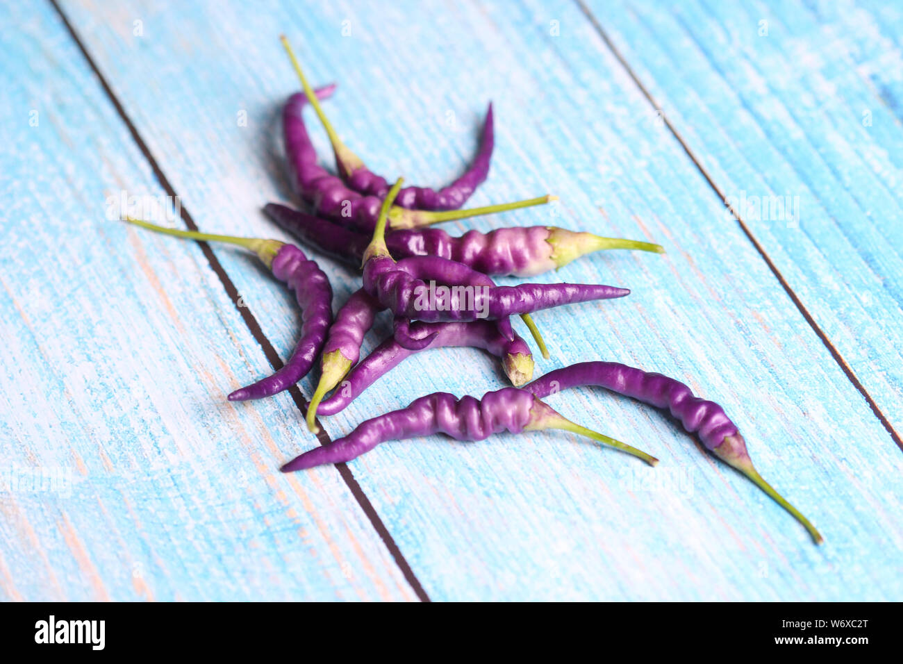 Purple chili peppers Stock Photo - Alamy