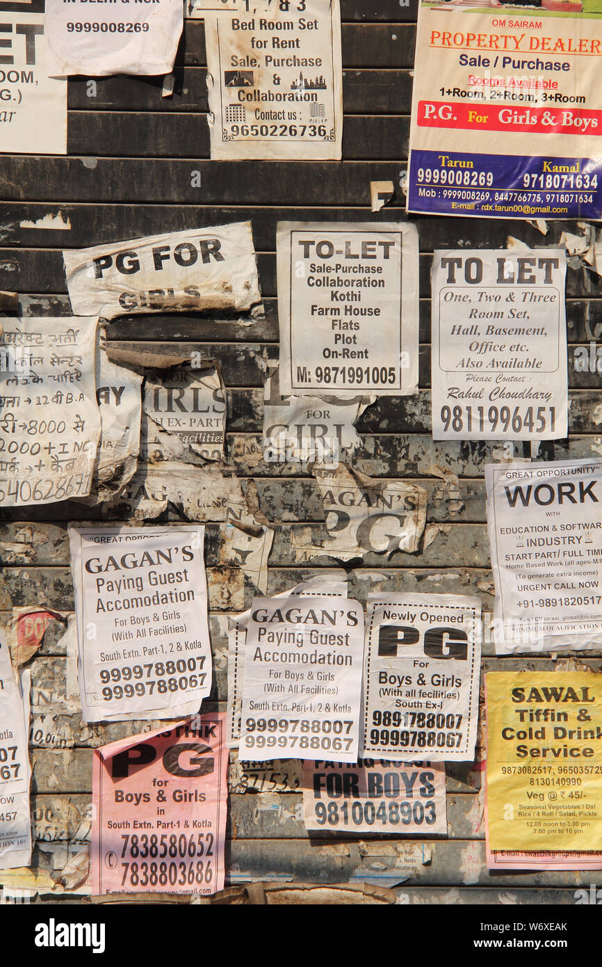 Assorted posters on the wall Stock Photo - Alamy