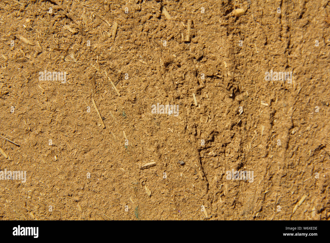 Details of the wall of a mud house Stock Photo - Alamy