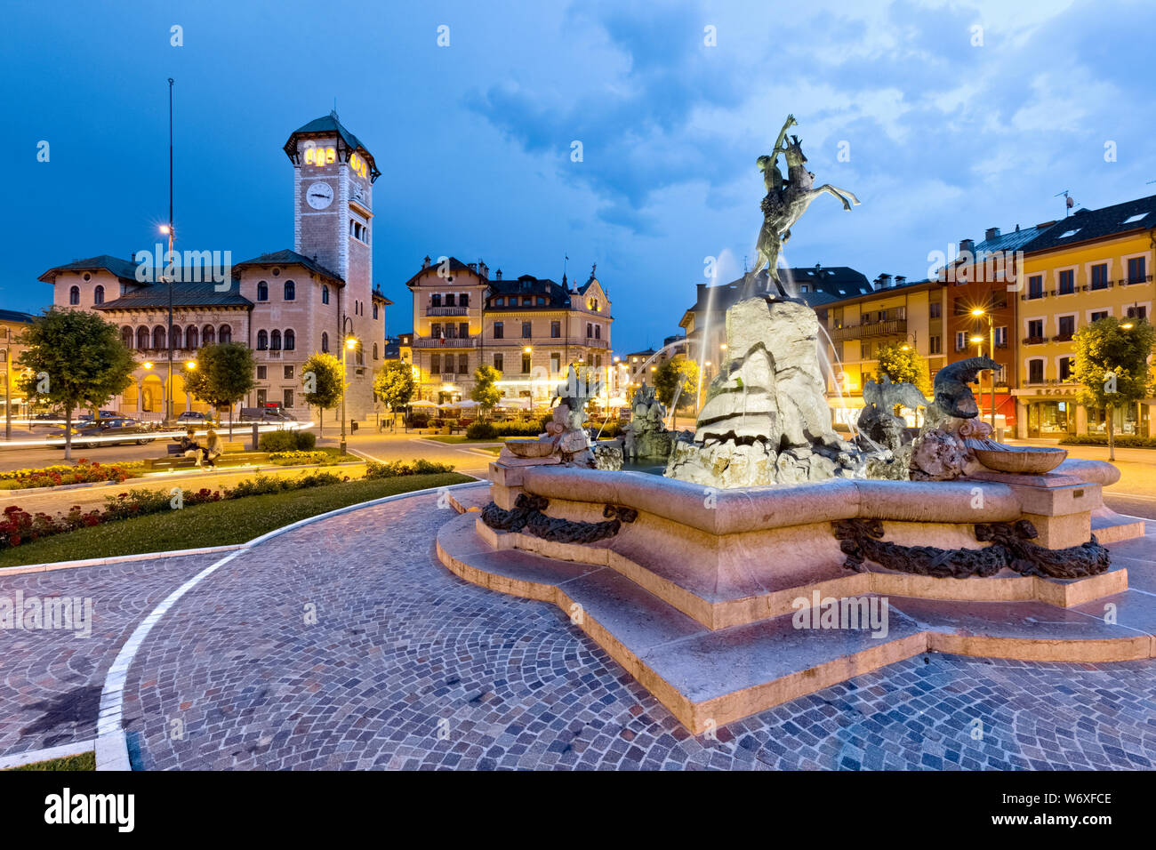 The main square of Asiago with the Faun fountain and the town hall ...