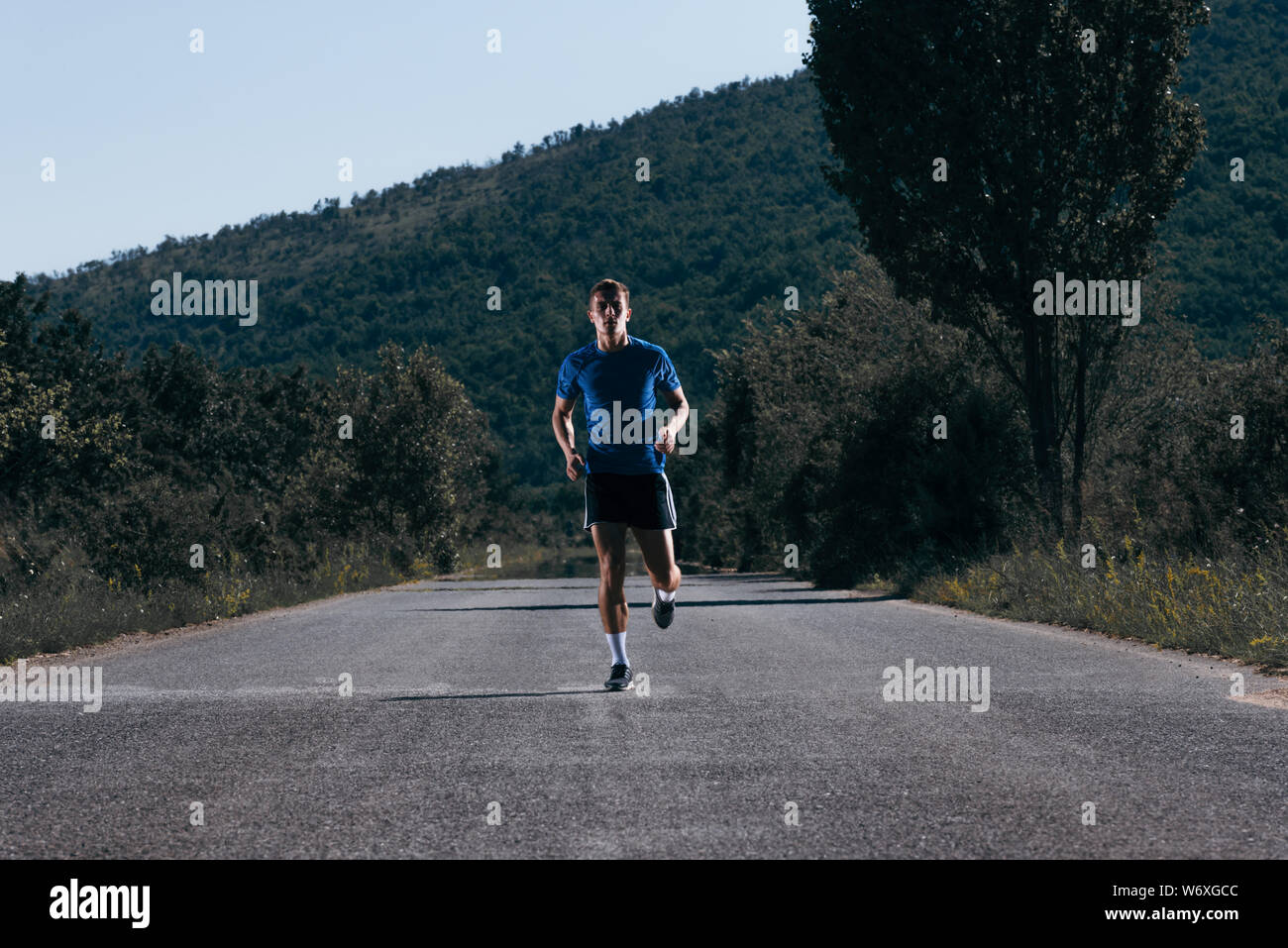 Finish line on empty road hi-res stock photography and images - Alamy