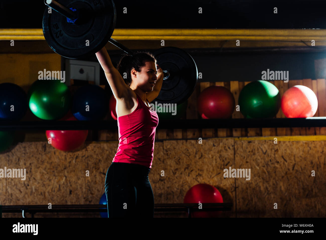 Strong woman is having gym workout routine Stock Photo - Alamy