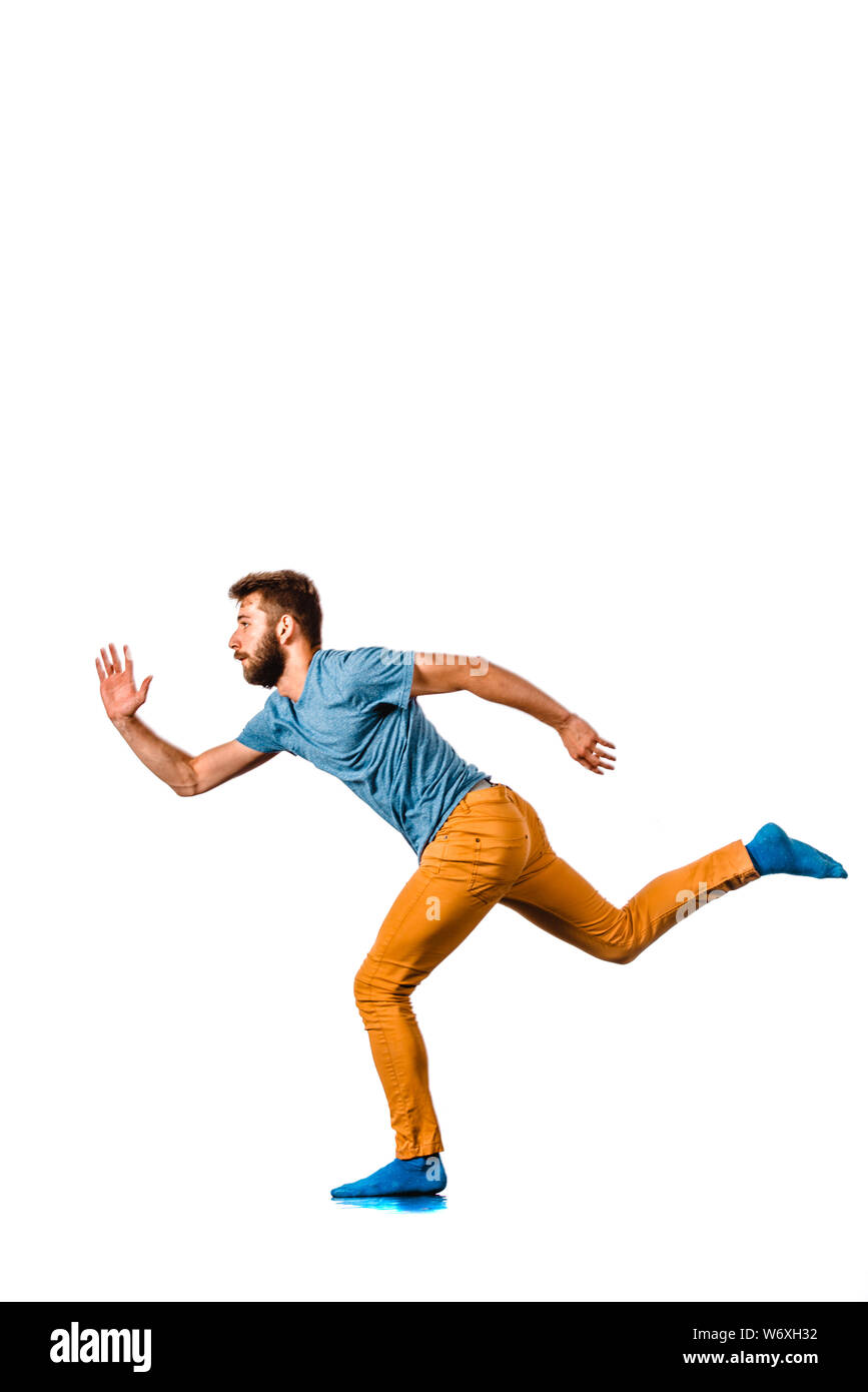 Young male executive dancing against white background Stock Photo - Alamy