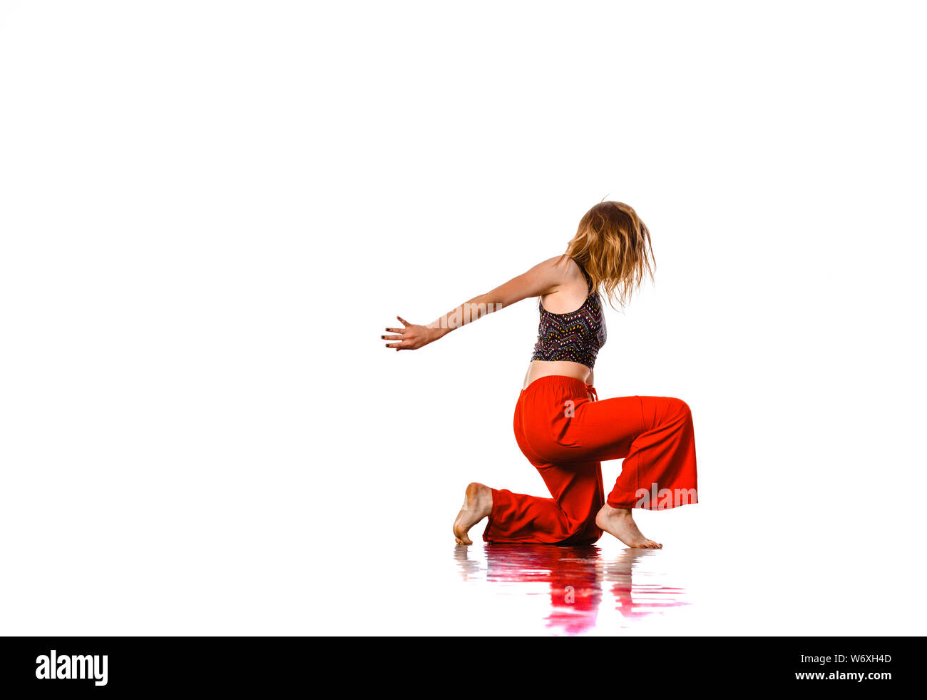 Joyful passionate woman dancing dance aerobics with raised arms. Full ...