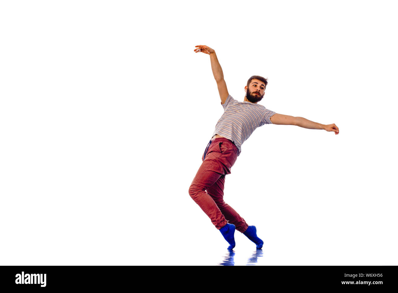 Cool guy doing brakdance on white background Stock Photo - Alamy