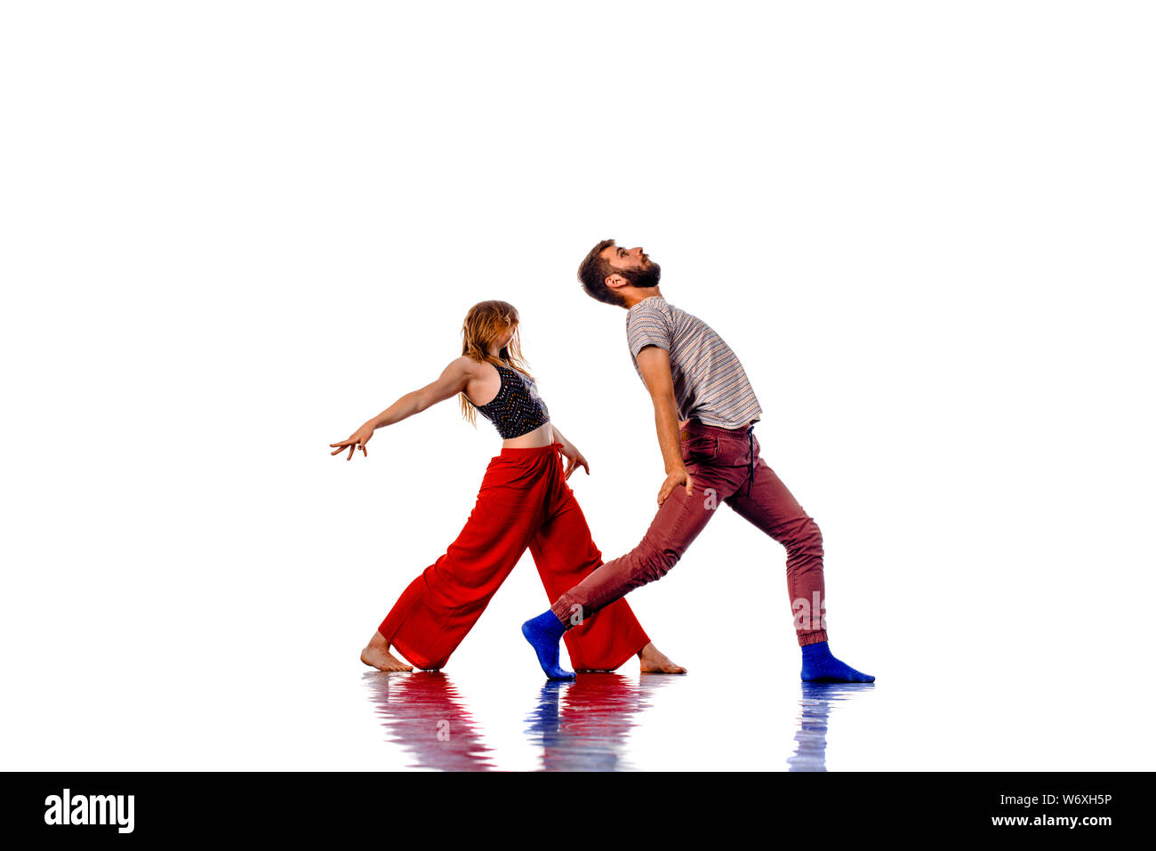 Two modern dancers couple woman and man dancing. Urban lifestyle. Hip ...