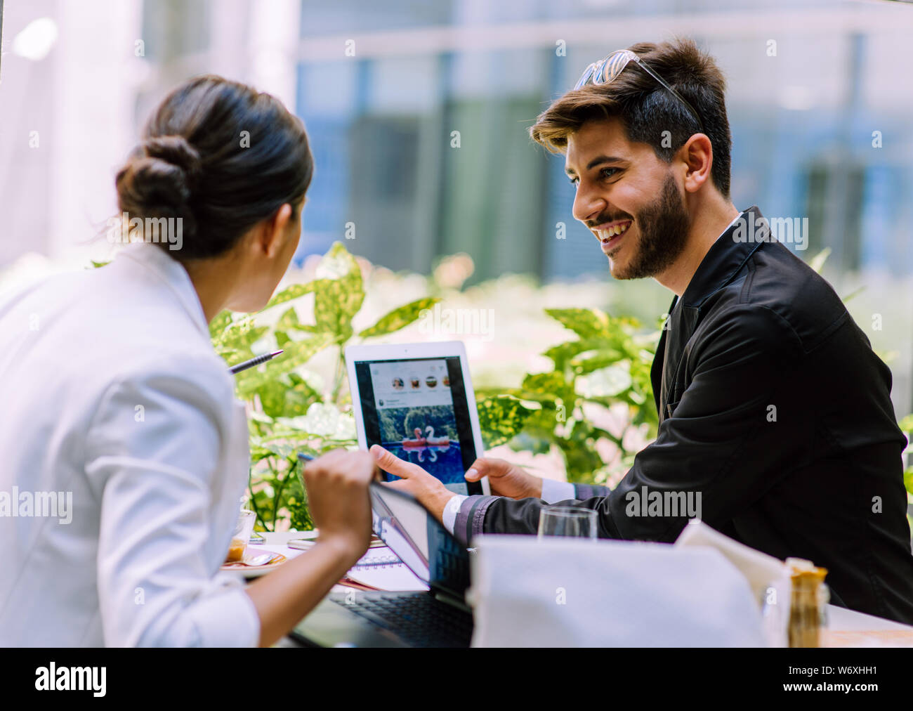 Attractive businessman showing the plan for next steps their ...