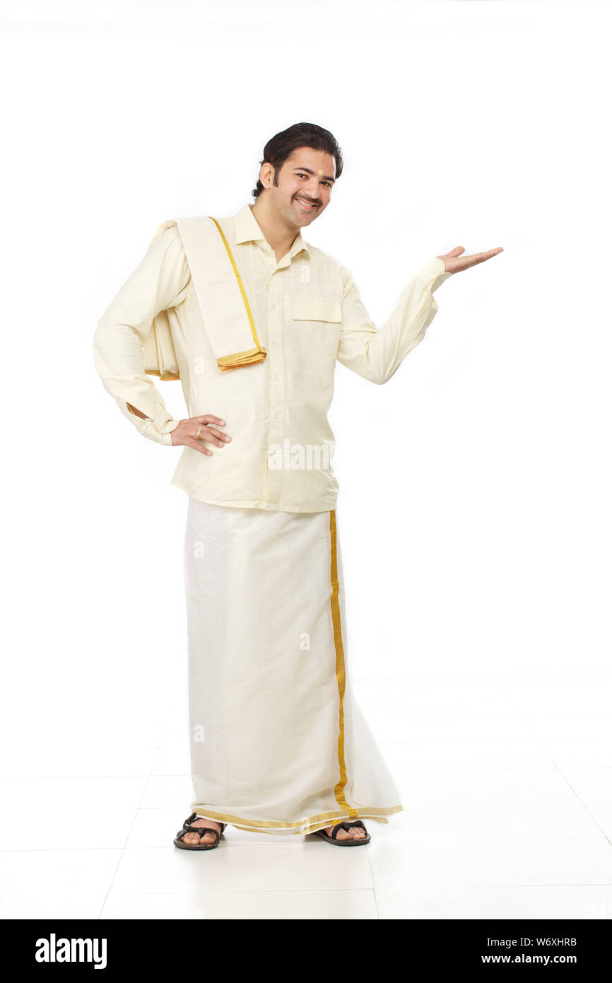 South Indian man smiling and gesturing Stock Photo - Alamy