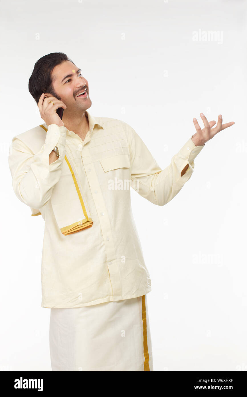 Indian man talking mobile gesturing hi-res stock photography and images ...
