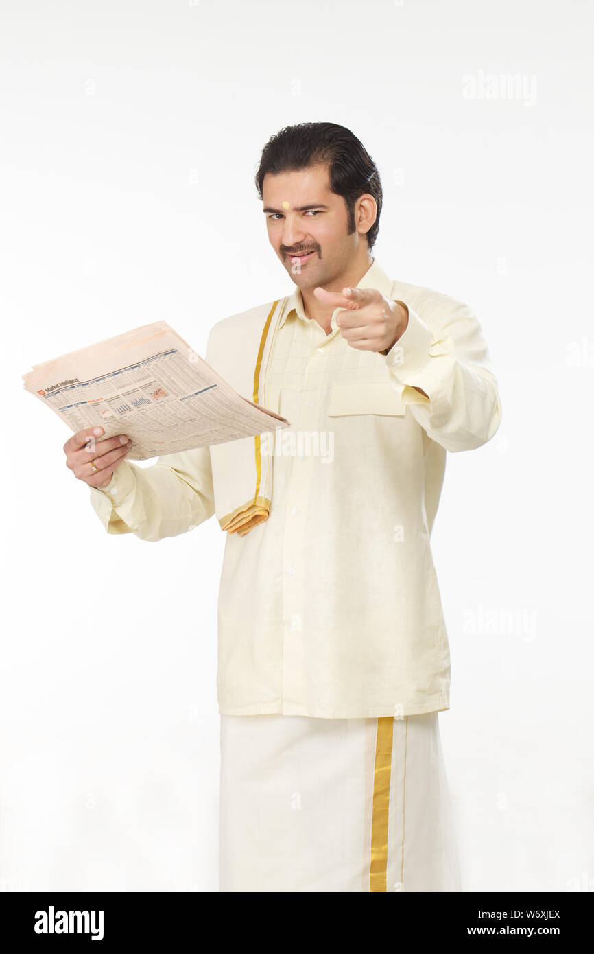South indian man standing finger hi-res stock photography and images ...