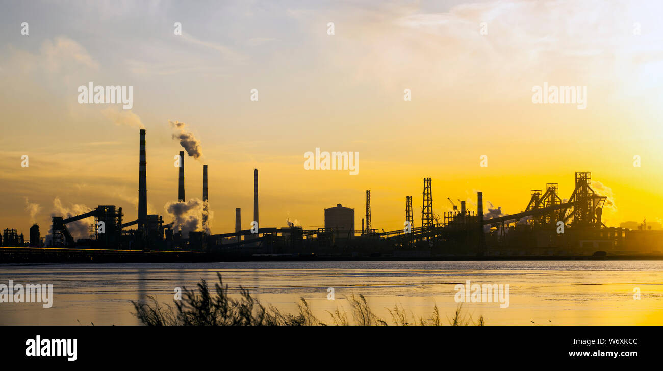Steel plant in the evening in the sunset Stock Photo - Alamy