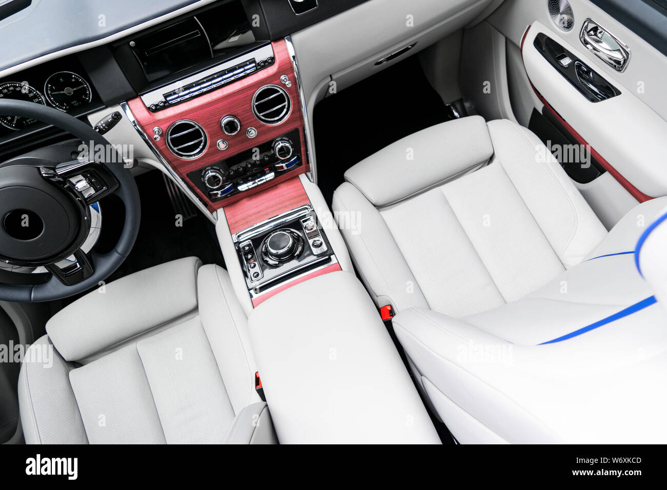Modern luxury car white leather interior with natural wood panel. Part ...