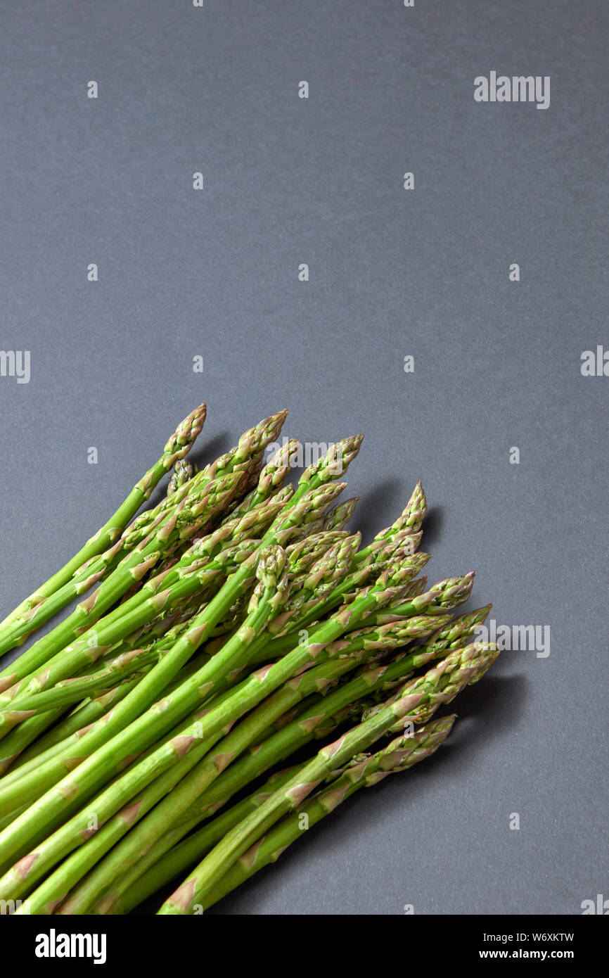 Freshly picked raw natural asparagus for preparation vegan food on a ...