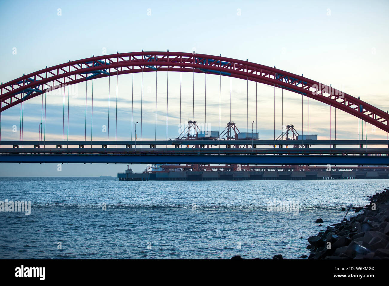 Container terminals and Bridges, cargo terminals in the evening Stock ...