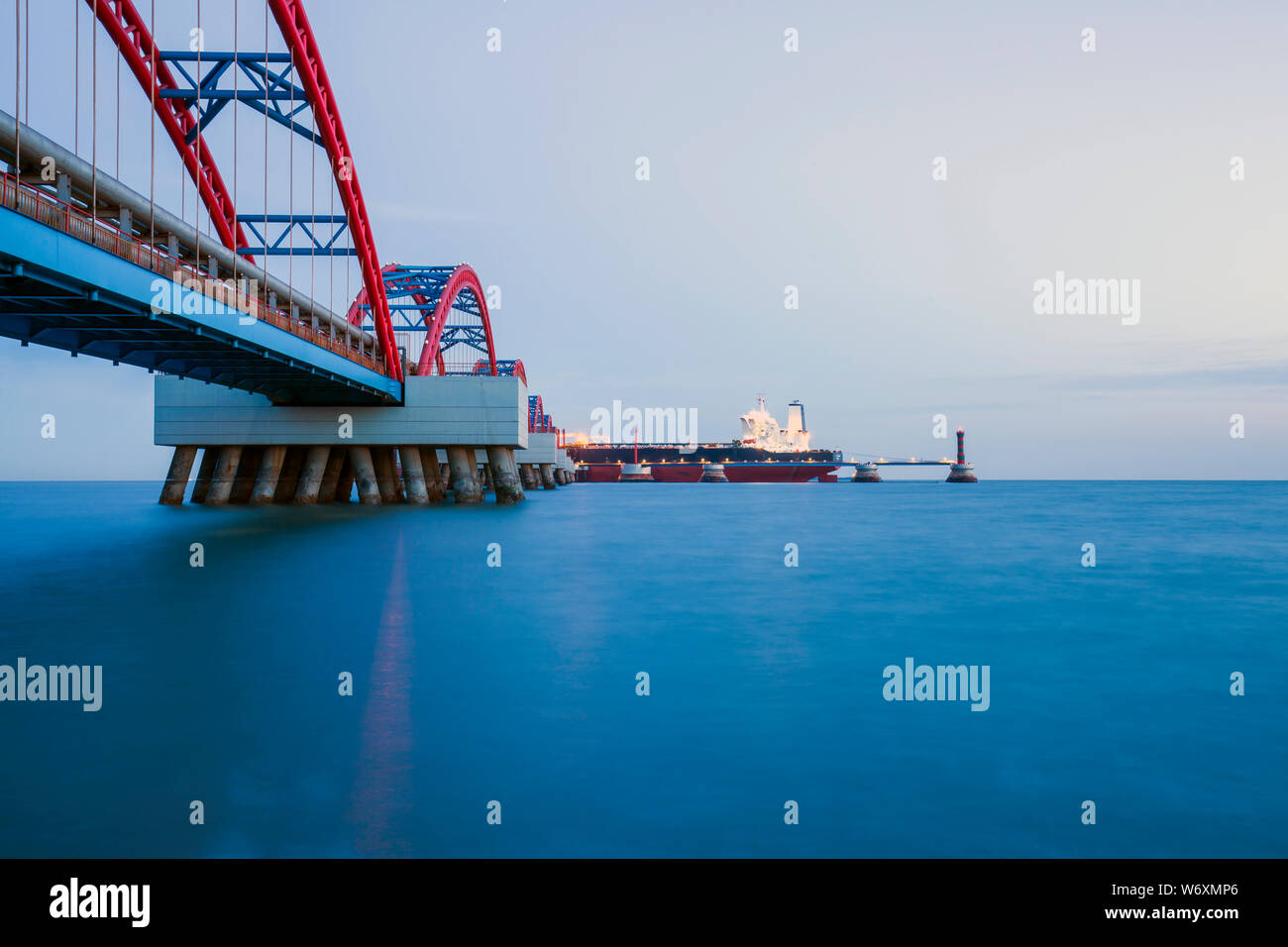 Container terminals and Bridges, cargo terminals in the evening Stock ...