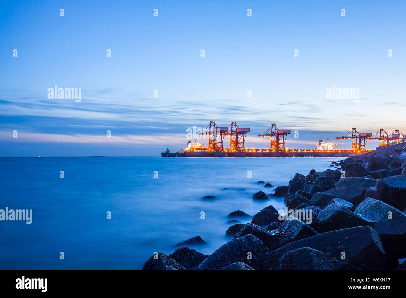 Container terminals and Bridges, cargo terminals in the evening Stock ...