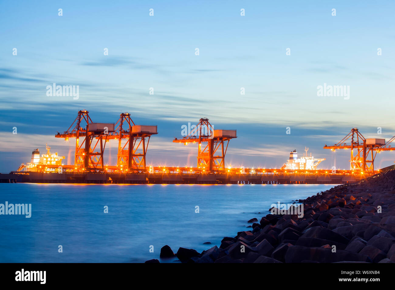 Container terminals and Bridges, cargo terminals in the evening Stock ...