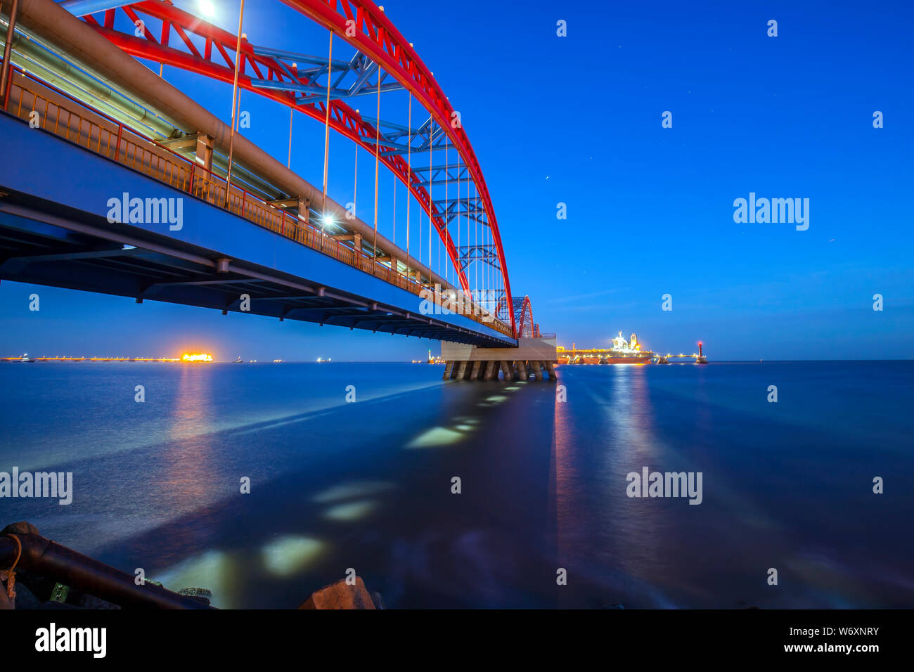 Container terminals and Bridges, cargo terminals in the evening Stock ...