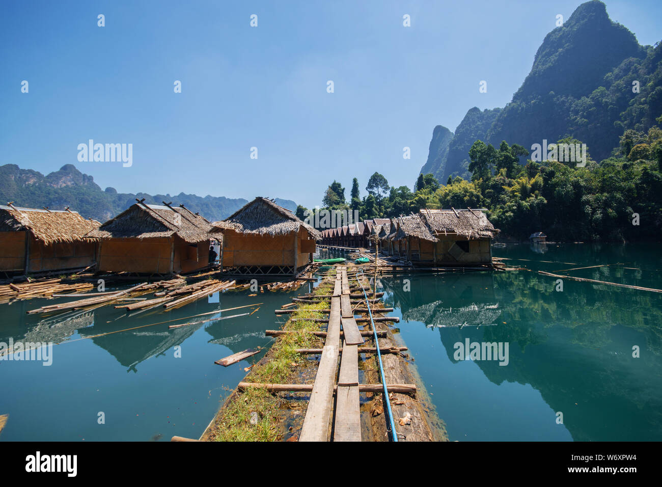 Natural attractions with bamboo huts on the water at Khao Sok National ...