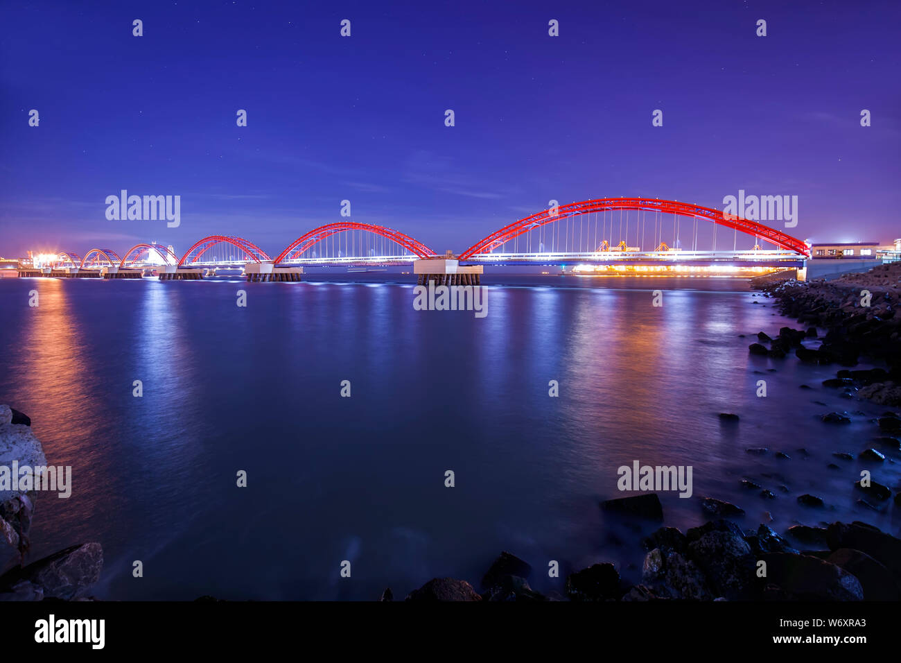 Container terminals and Bridges, cargo terminals in the evening Stock ...