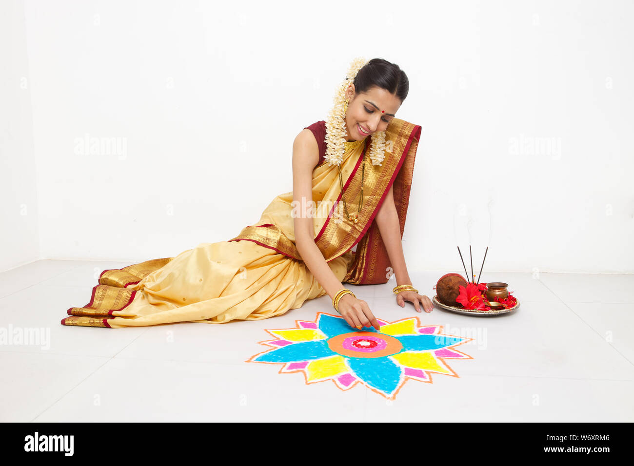 Woman Making A Rangoli High Resolution Stock Photography and Images - Alamy