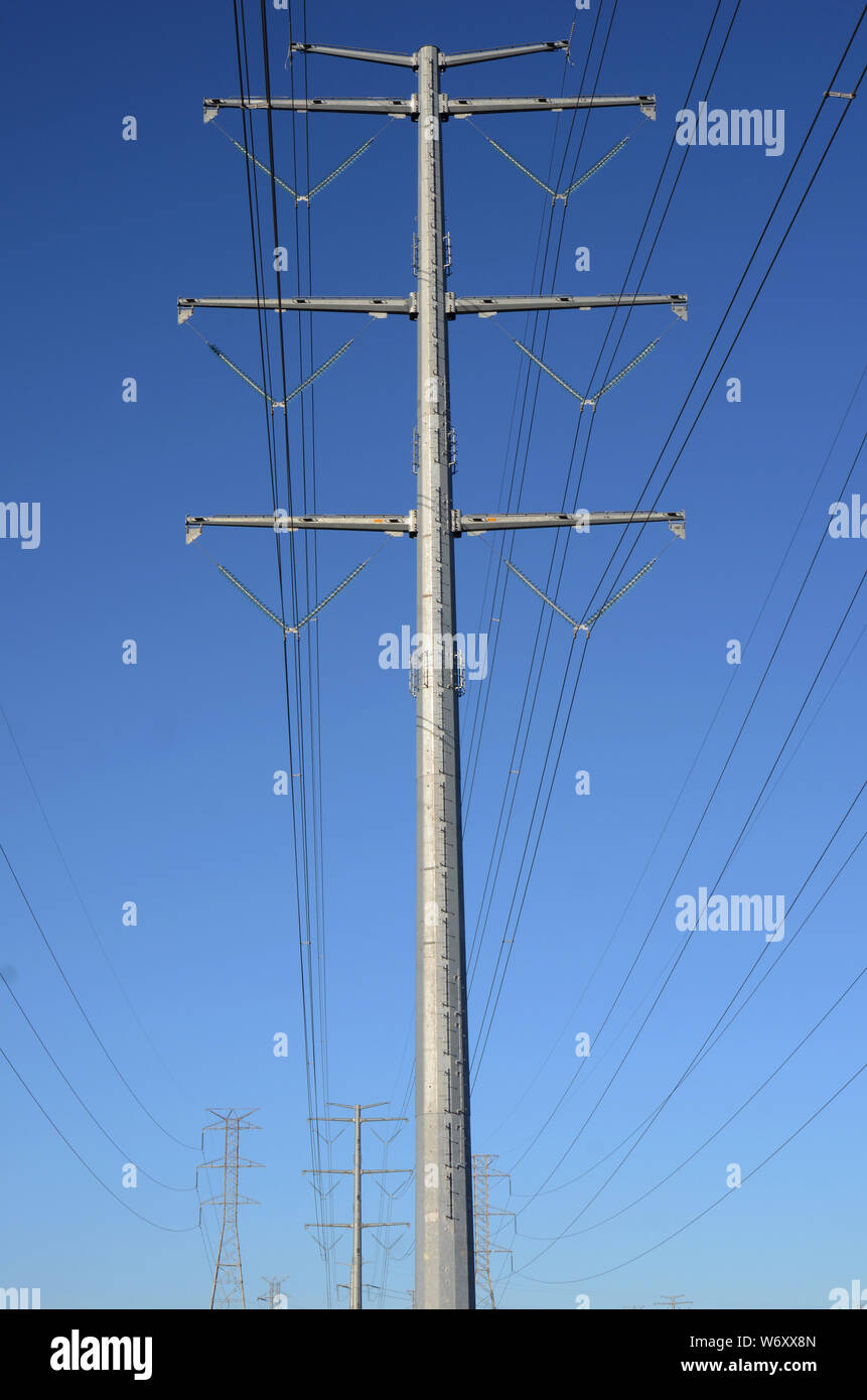 LOOK UP FOR POWER High tension electric towers stand tall Stock Photo ...