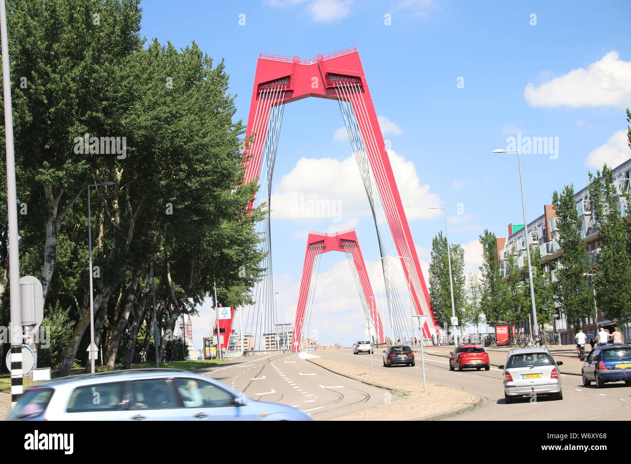 Red ,colored ,Bridge ,called ,Willemsbrug ,river, Nieuwe Maas, connect ...