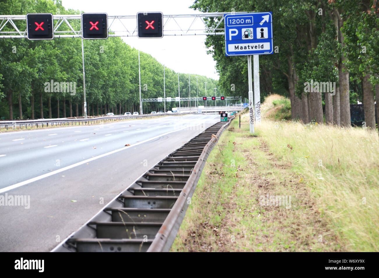 Red crosses above driving lanes on motorway A20 which indicate that the ...