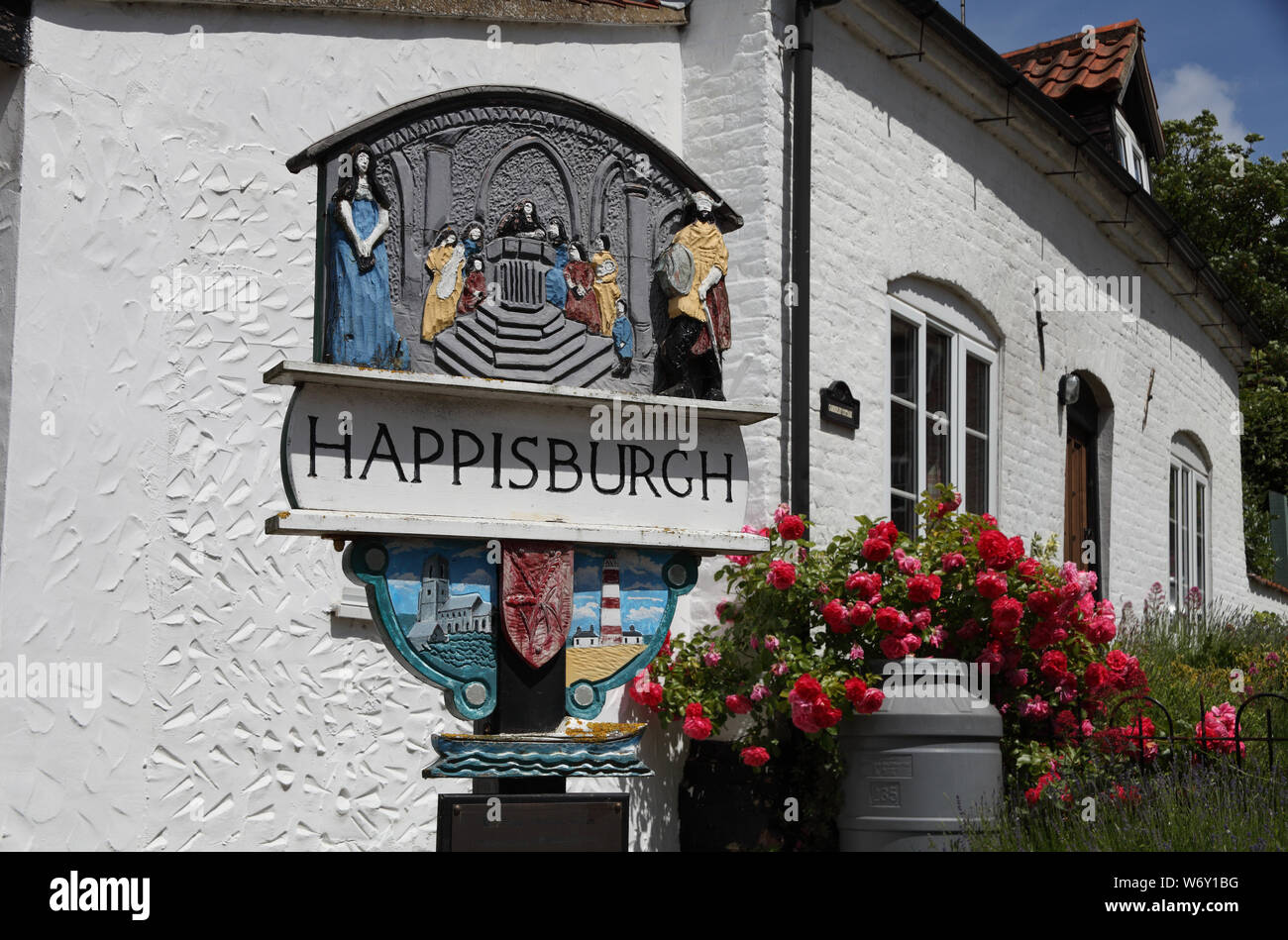 Painted village sign of attractive and historical Happisburgh, Norfolk ...