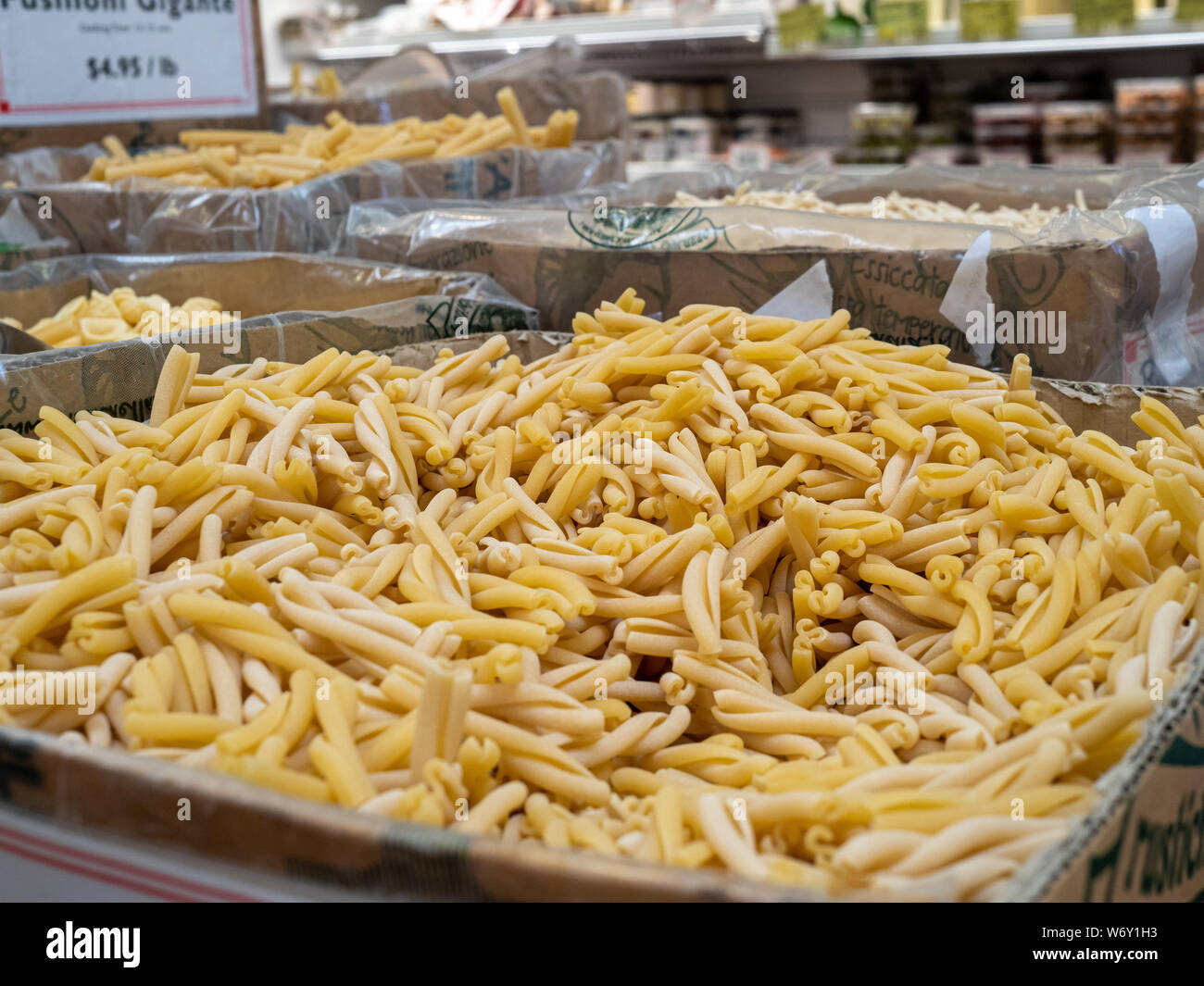 Mound of dried gemelli pasta in storage ready to cook Stock Photo - Alamy