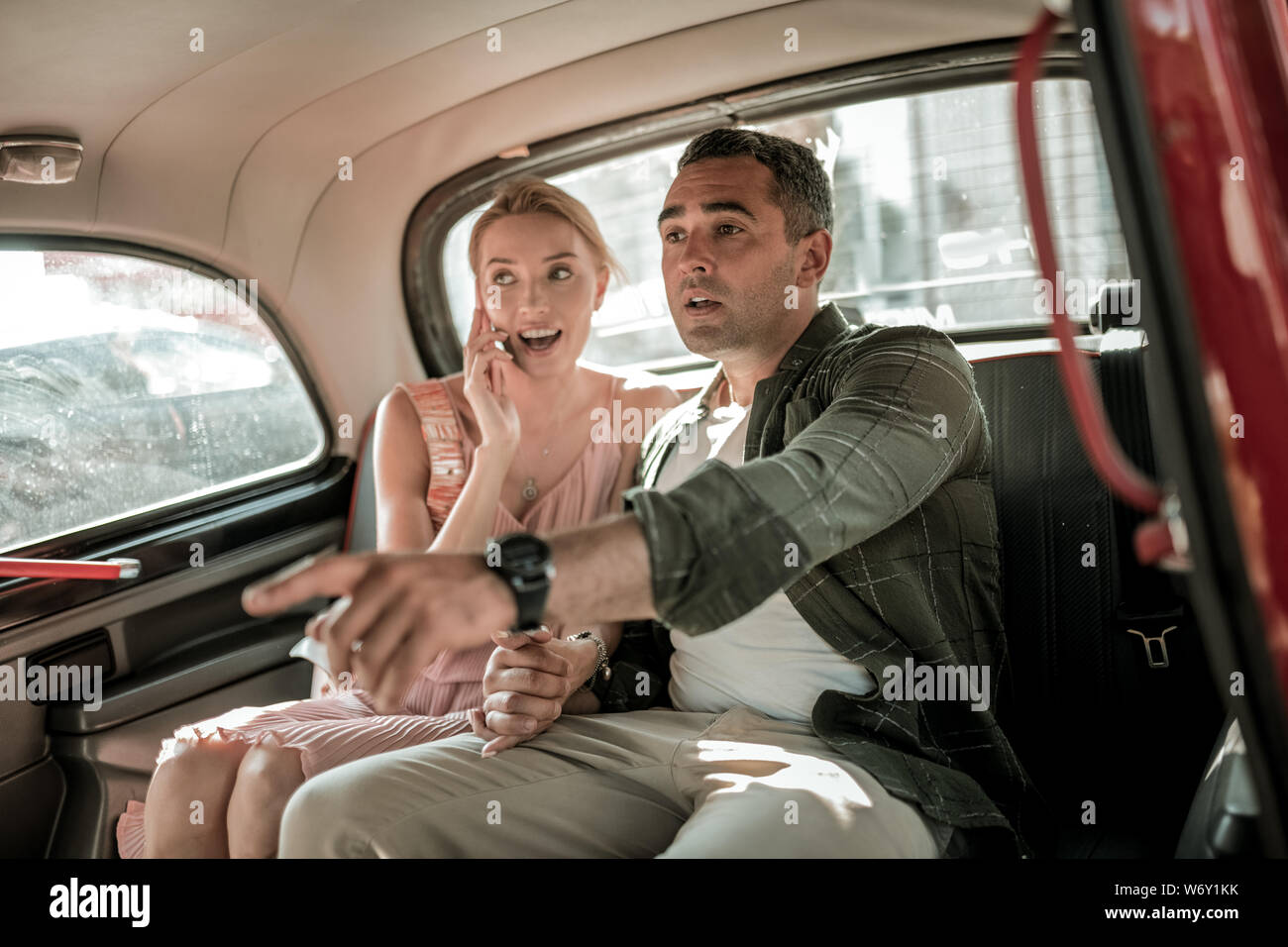 Driver and passenger in backseat hi-res stock photography and images ...