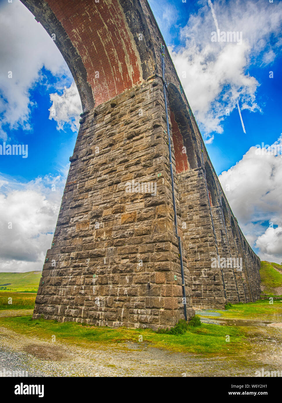 Closeup view of a large old Victorian railway viaduct across valley in ...