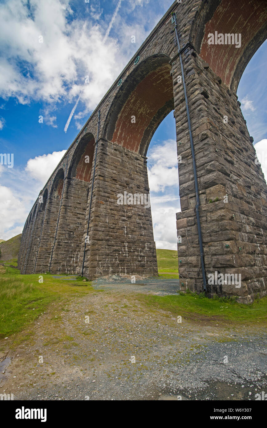 Closeup view of a large old Victorian railway viaduct across valley in ...